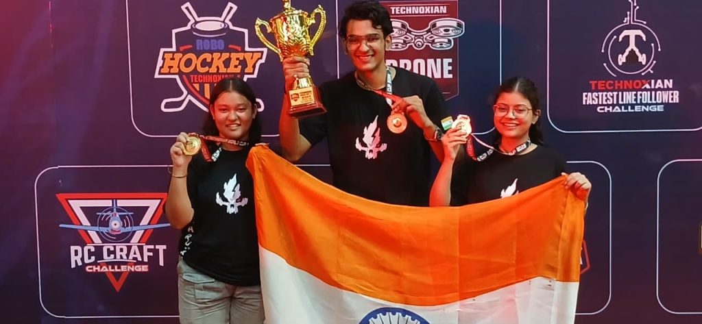 Winning the Trophy at Technoxian World Robotics Championship